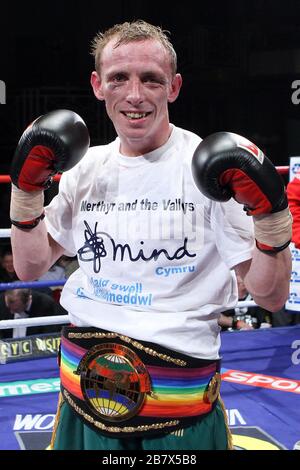 Jamie Arthur (green shorts) defeats Kris Hughes (black shorts) in a ...