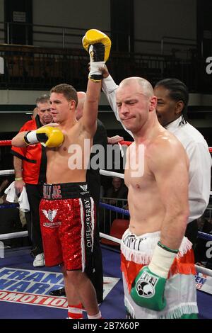 Billy Joe Saunders (red shorts) defeats Tommy Tolan in a Middleweight ...