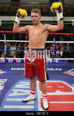 Billy Joe Saunders (red shorts) defeats Tommy Tolan in a Middleweight ...