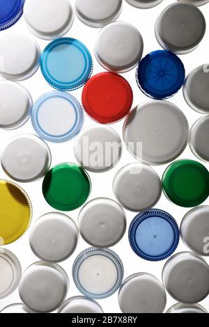 Plastic bottle caps. Close-up shot of stack of recyclable plastic ...