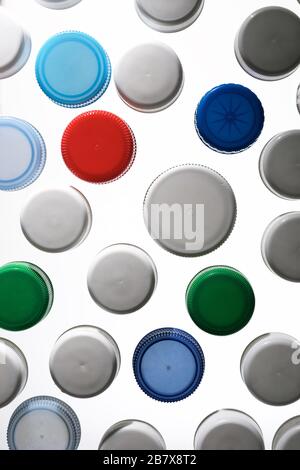 Plastic bottle caps. Close-up shot of stack of recyclable plastic ...