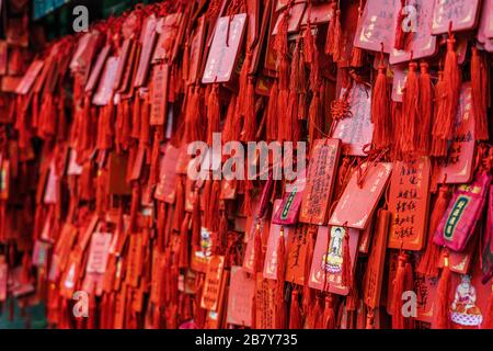 Traditional Chinese prayer cards hang outside Buddhist temple ...