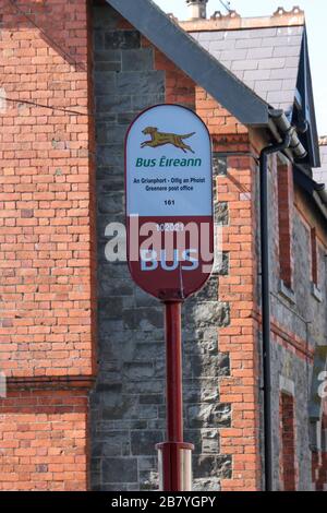 A Bus Eireann bus stop sign (and logo) in Cahir, Ireland (Eire Stock ...