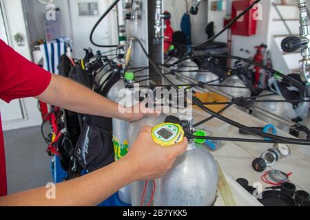 Scuba diving equipment and the filling station with nitrox cylinders on ...