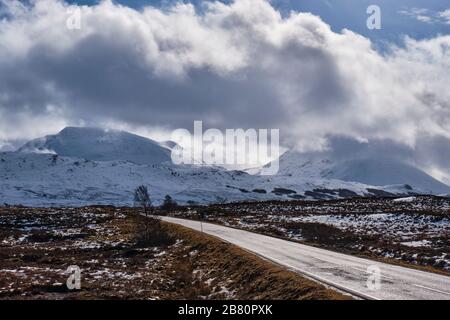 a82 trunk road through the scottish highlands with snow covered ...
