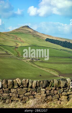Shutlingsloe hill viewed over dry stone wall near the village of ...