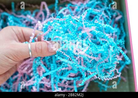 Paper shavings. Colored cut paper for packaging Stock Photo - Alamy