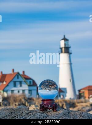 Glass sphere with reverse reflection in hand Stock Photo - Alamy