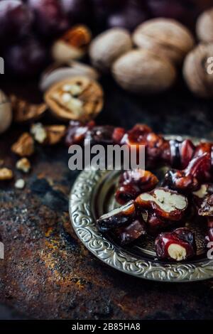 Sweet churchkhela with ingredients on metal plate Stock Photo - Alamy