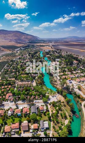 Aerial panorama of Kibbutz Nir David in Northern Israel with orchards ...