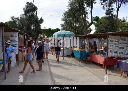 Market stalls at the popular hippie market,El Pilar de la Mola ...