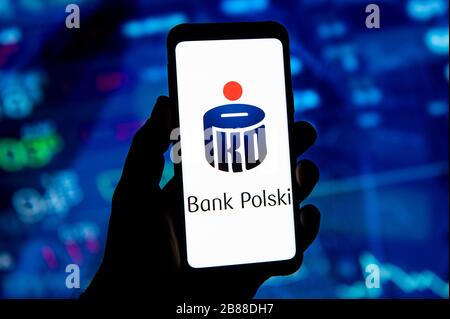 In this photo illustration a PKO Bank Polski logo seen displayed on a ...