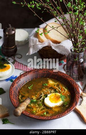 Green Russian Potato, Spinach, and Sorrel Soup with egg Stock Photo - Alamy