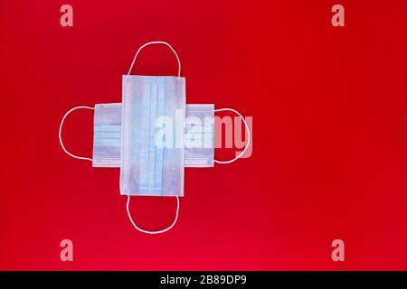Top view of medical masks with red omicron variant lettering,stock ...