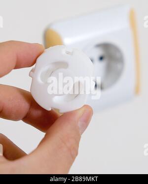 child protection apparatus for electrical outlets Stock Photo - Alamy