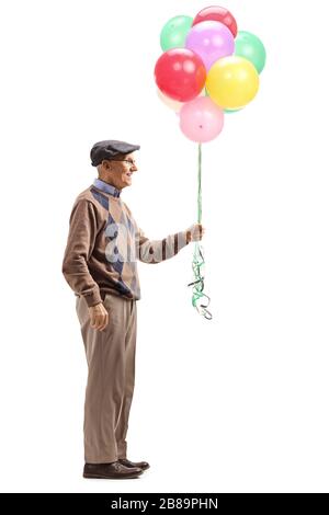 A vertical shot of a fly holding on to a pine tree spikes Stock Photo ...