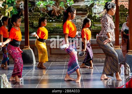 Traditional Balinese dance lesson for children in a dance school in ...