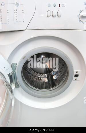 Detail view of washing machine control panel with contemporary ...