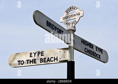 The Cockcrowing finger post road sign just off the A35 at Higher Eype ...