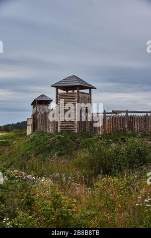 An old military fortress built of coniferous logs. At the corners of ...
