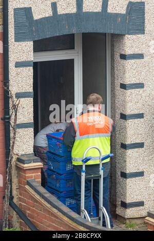 UK Tesco customer service in store Click and Collect counter using ...