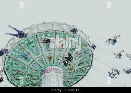 Paris carousel - Chair swing ride in amusement park at Tuileries garden ...