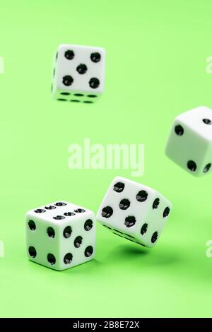 Rolled dices on white background Stock Photo - Alamy
