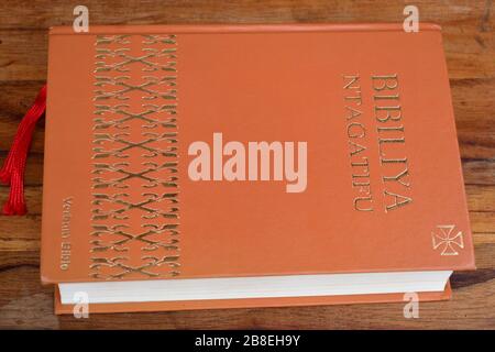 Kinyarwanda language Catholic Holy Bible on wooden table Stock Photo ...