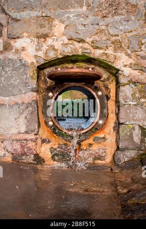 sewer water pipe outlet beach Stock Photo - Alamy