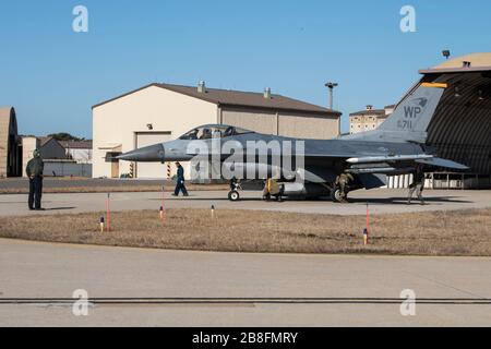 Airmen assigned to the 8th Fighter Wing participate in the selective ...