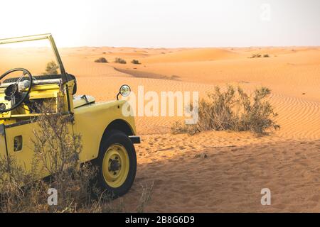 Land Rover in the desert of Dubai - UAE Stock Photo - Alamy