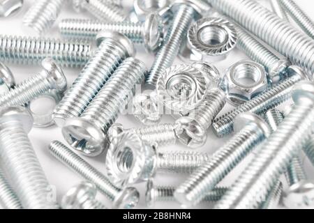 Metal bolts a row background. Chromed screw bolts texture. Steel bolts ...