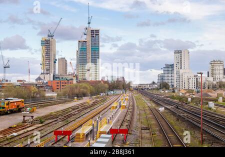 View along railway lines to the new skyscraper tower blocks of the ...
