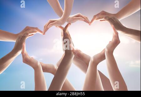 Diversity love and unity partnership as heart hands in groups of ...
