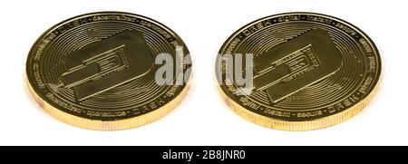 Face and back of the crypto currency golden bitcoin isolated on white ...