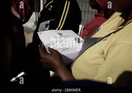 South African police check asylum papers of an African foreign national ...