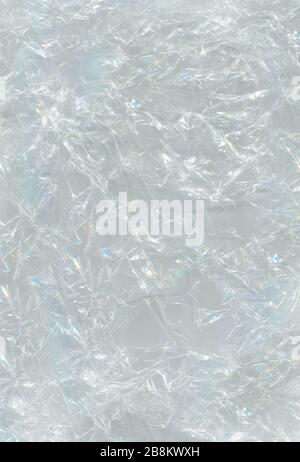Texture of white crumpled cellophane surface transparent on sunlight ...