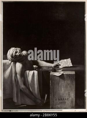 Jacques-Louis David’s iconic painting The Death of Marat (1793) depicts ...