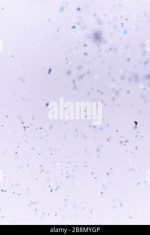 Silver falling confetti on metallic backdrop. Festive and party concept ...