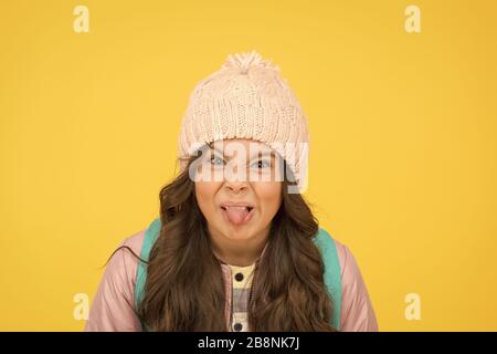 Ugh, yuck. Little schoolchild stick tongue. Little kid make grimace ...