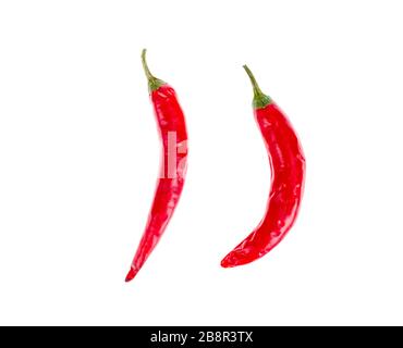 Two small red chili peppers on white background Stock Photo - Alamy
