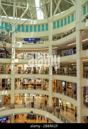 Cavernous atrium in multilevel Suria KLCC shopping mall at the base of ...