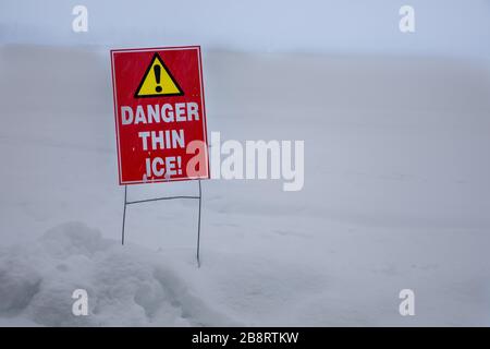 Warning Notice - unsafe ice Stock Photo - Alamy
