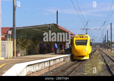 Queensland Rail Tilt train crossing Bourbong Street at Bundaberg ...