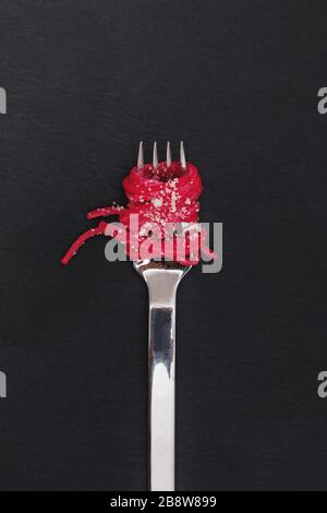 Spaghetti fork on dark black background / Traditional delicious food ...