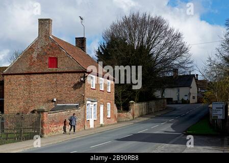 The old butcher's shop in the estate village of Sledmere, East ...