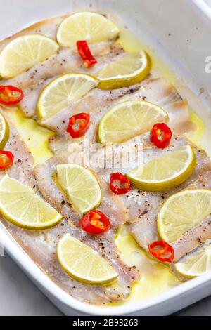 baked cod fish with lemon and chilli Stock Photo - Alamy