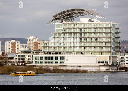 Cardiff Bay with St Davids (Voco) hotel across the water. Launch comes ...