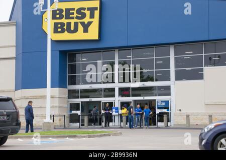 Customers at Best Buy electronics store browse the large flat screen ...