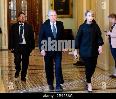 Senator Mitch McConnell (R-KY), the Senate Minority Leader, walks ...